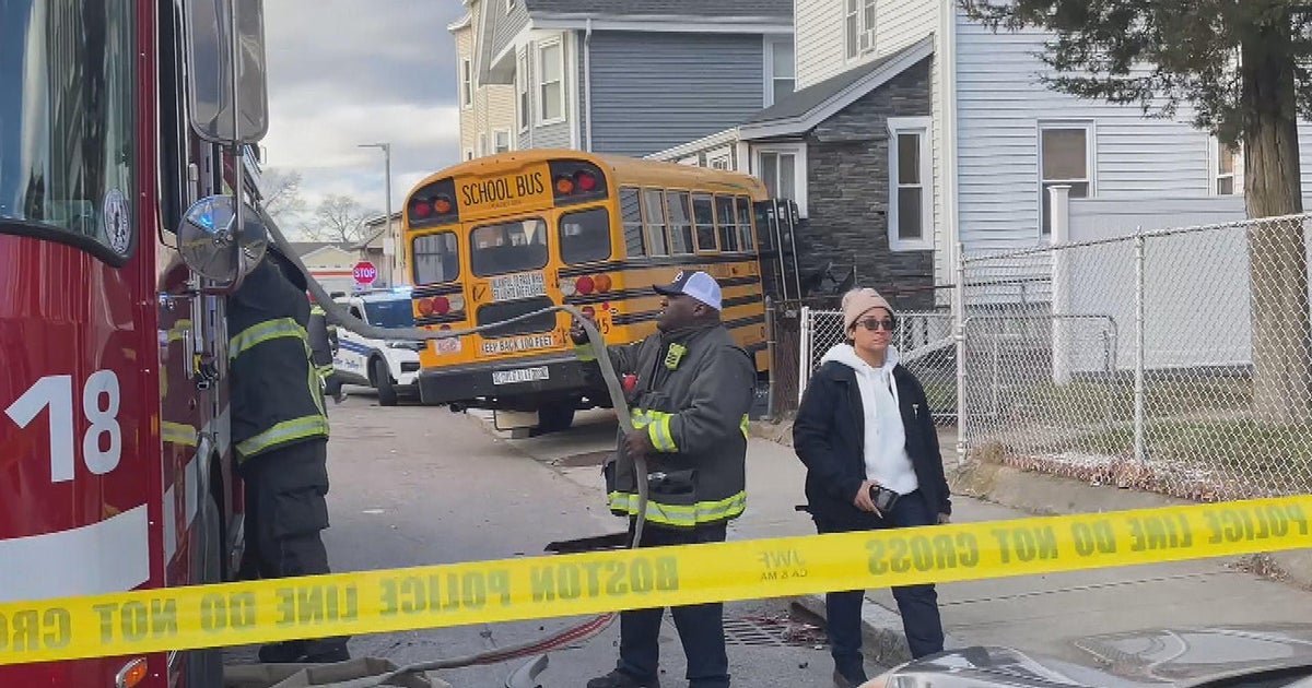 Surveillance video shows school bus crash into Dorchester home - CBS Boston