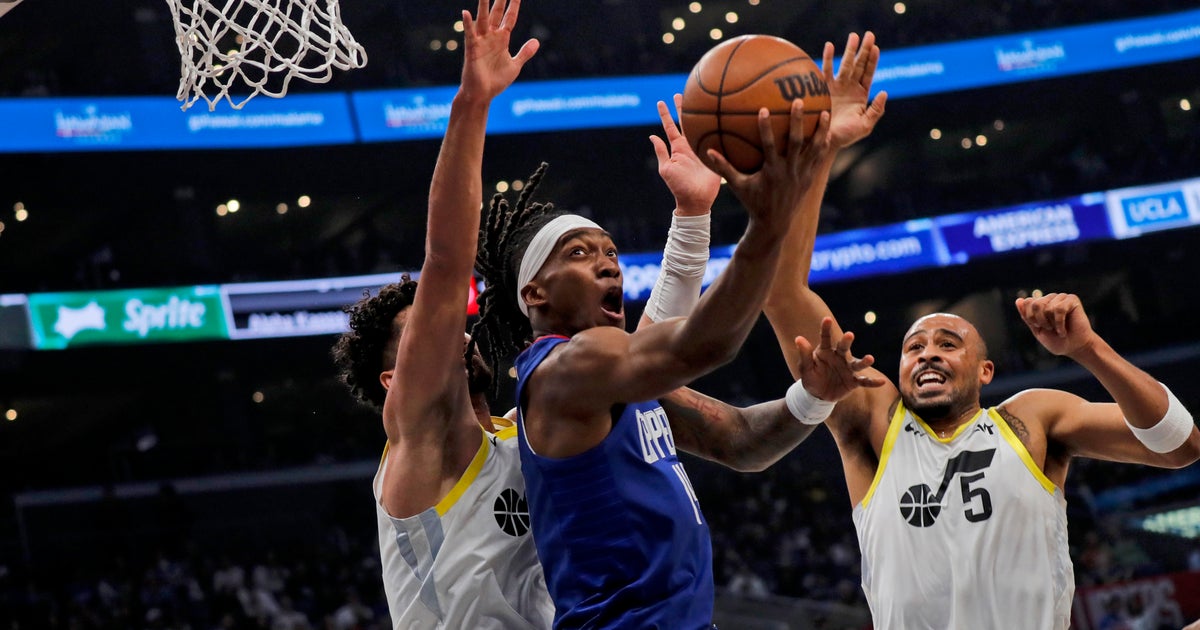 Mann leads 8 Clippers in double figures in 131-102 rout of Jazz. Utah ...