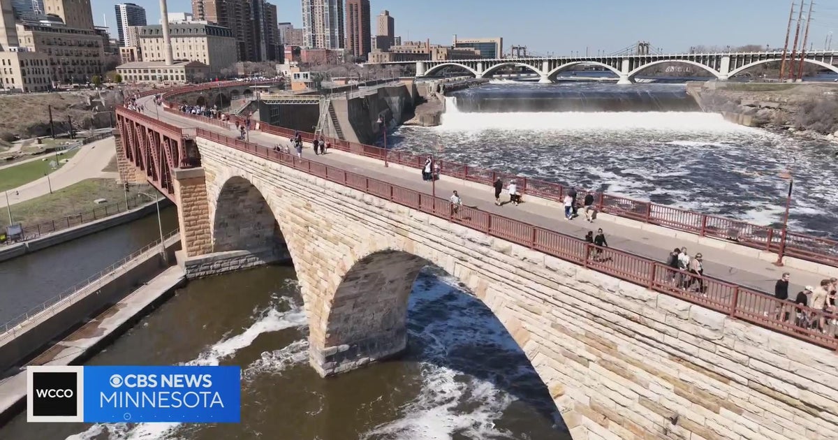 Folks out enjoying the Stone Arch Bridge before it closes on Monday for ...