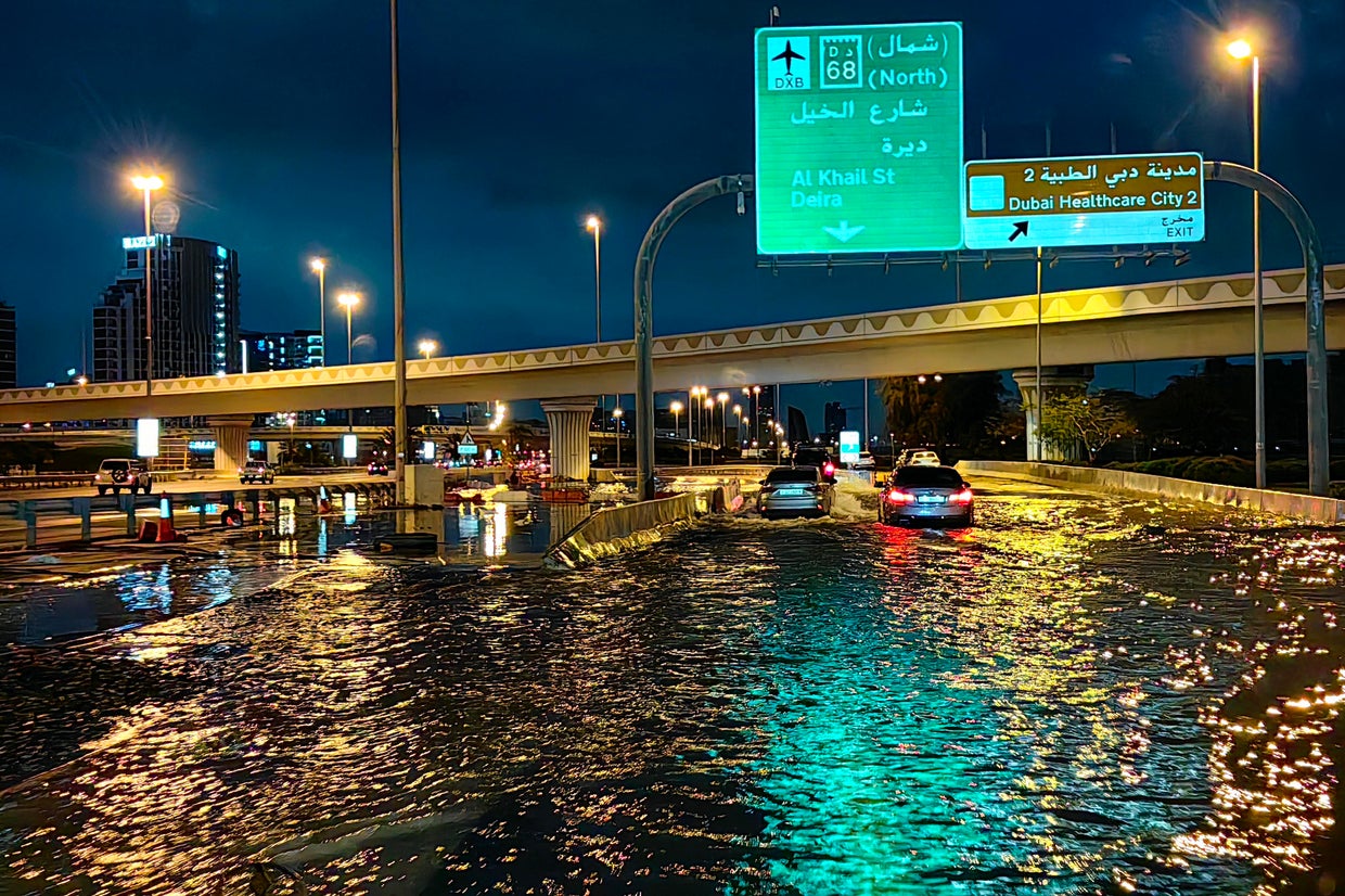 Dubai flooding hobbles major airport's operations as "historic weather ...