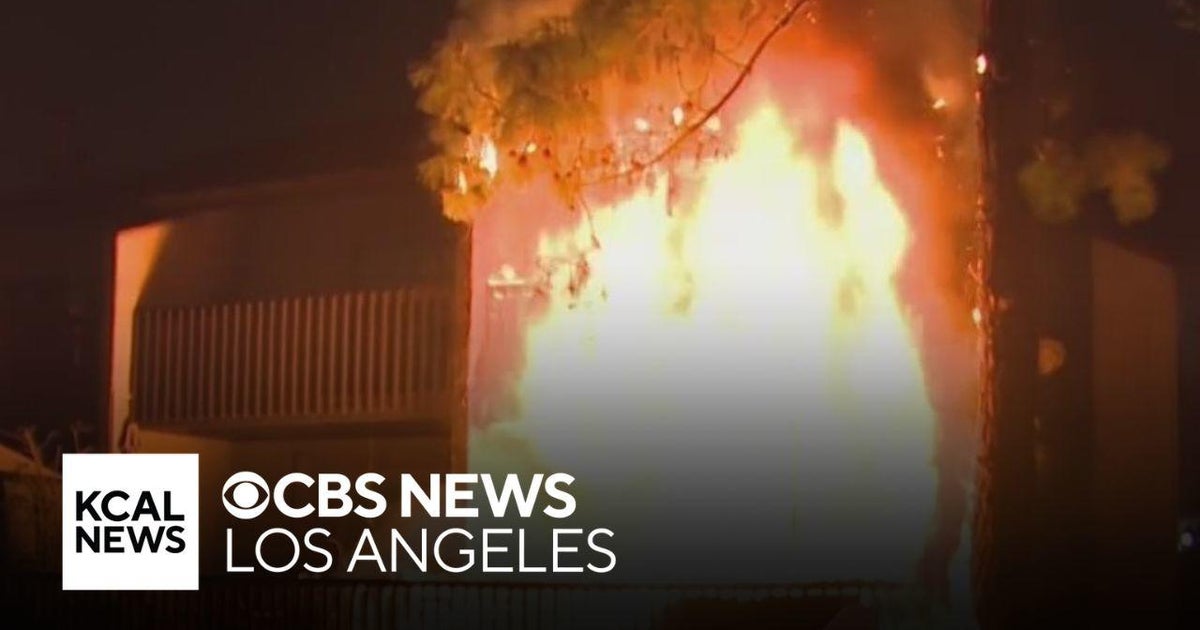 Long Beach fire crews tackle massive condo fire - CBS Los Angeles