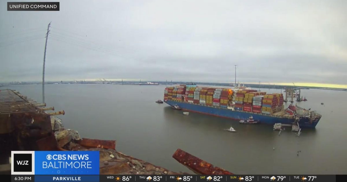 Salvage crews work to reopen main channel to Port of Baltimore, and ...