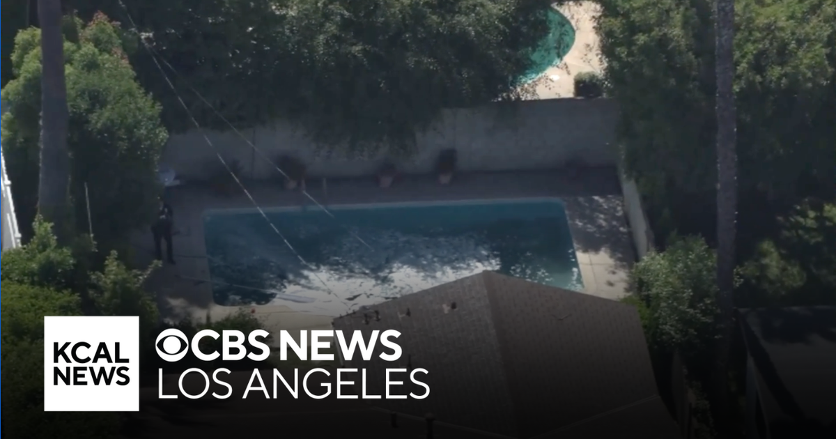 Man found dead in pool at home in Encino - CBS Los Angeles