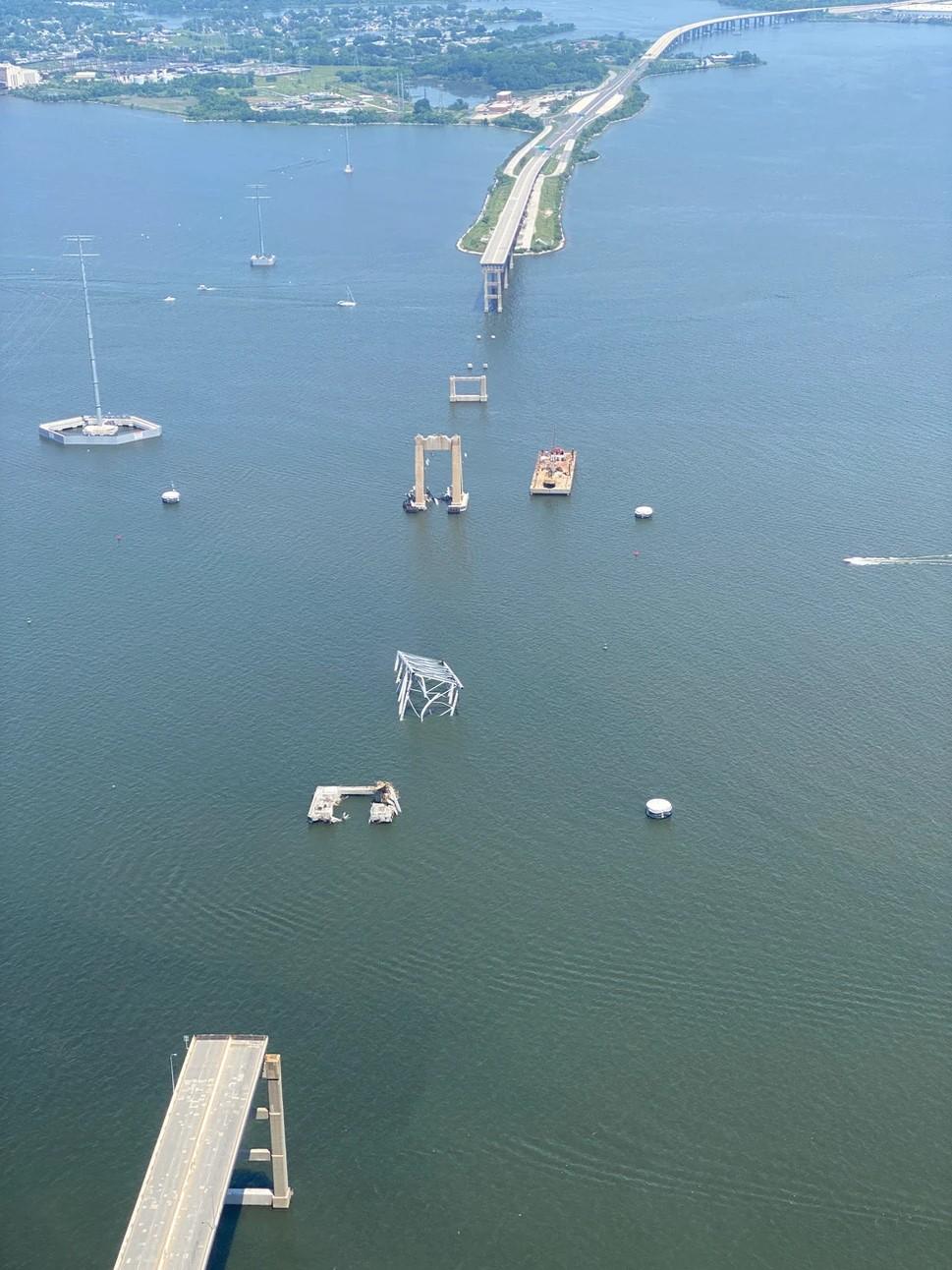 Photos: Aerial view of progress at the Key Bridge collapse site as ...