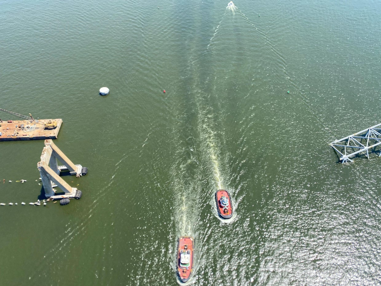 Photos: Aerial view of progress at the Key Bridge collapse site as ...