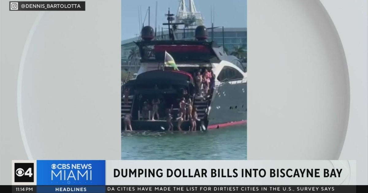 Viral video showing boaters dumping dollar bills into Biscayne Bay ...