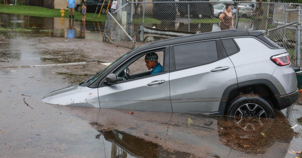 Entire Florida neighborhoods underwater after heavy rain - CBS News