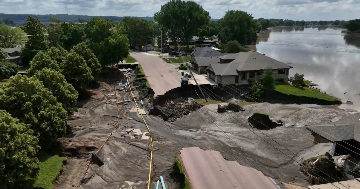 Raging flood waters wreak havoc across Midwest - CBS News