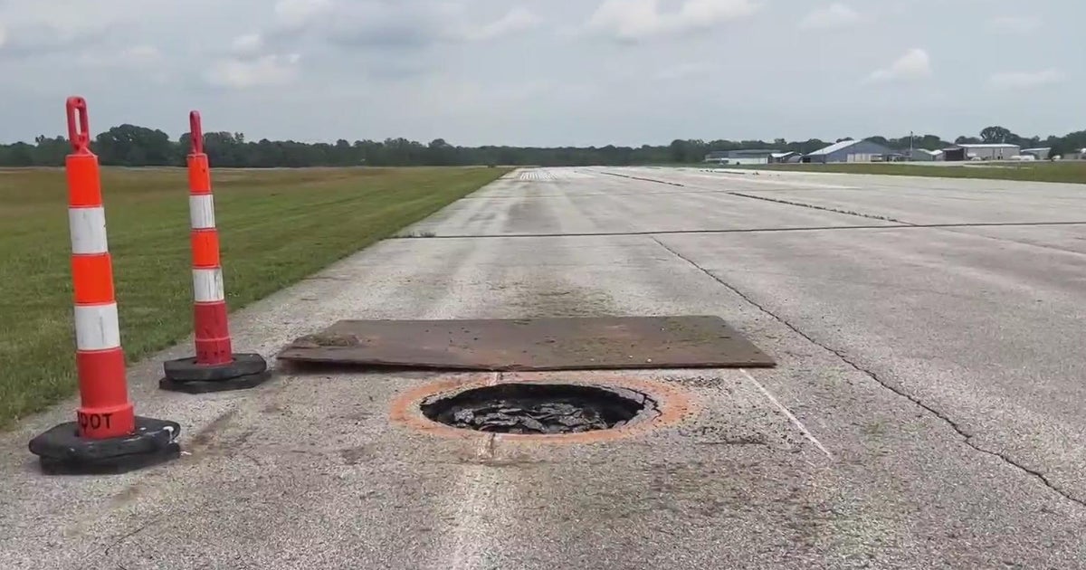 Sinkhole discovered on airport runway in St. Clair County - CBS Detroit