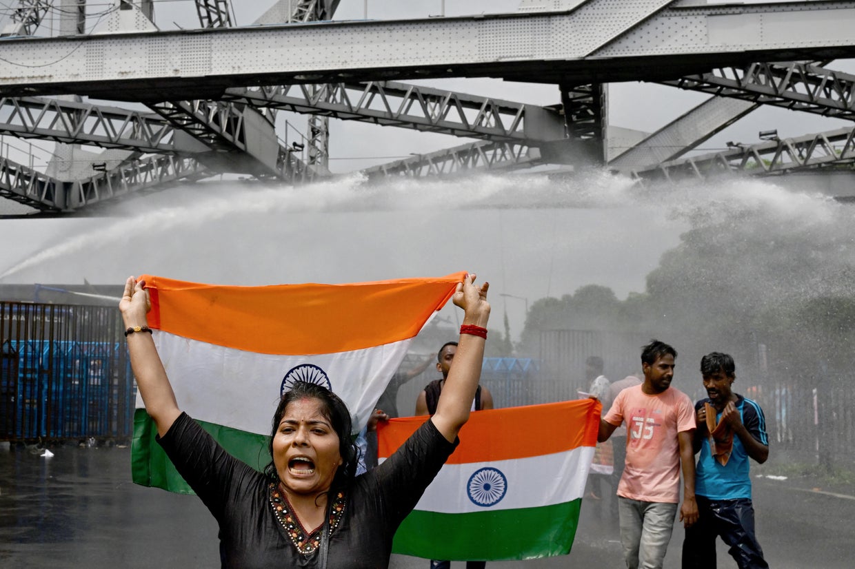 New protests over rape and murder of Indian doctor see police use water ...