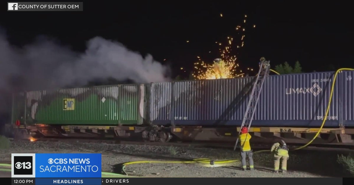 Train cars carrying lithium-ion car batteries catch fire near ...