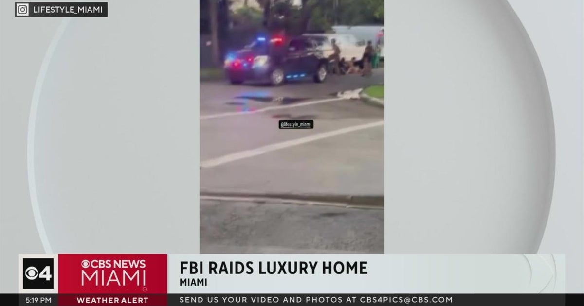 FBI raid on Miami luxury home startles neighbors - CBS Miami