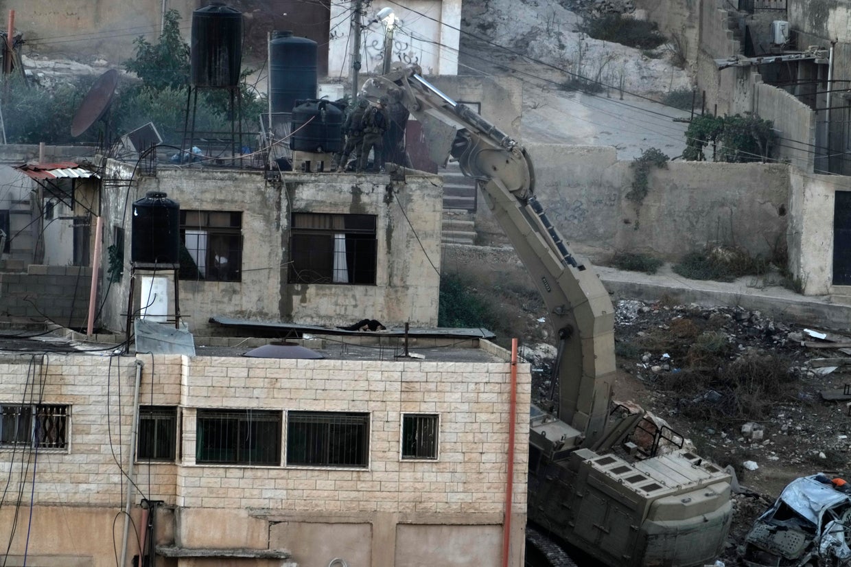 Israeli soldiers seen pushing bodies off rooftops during raid in ...