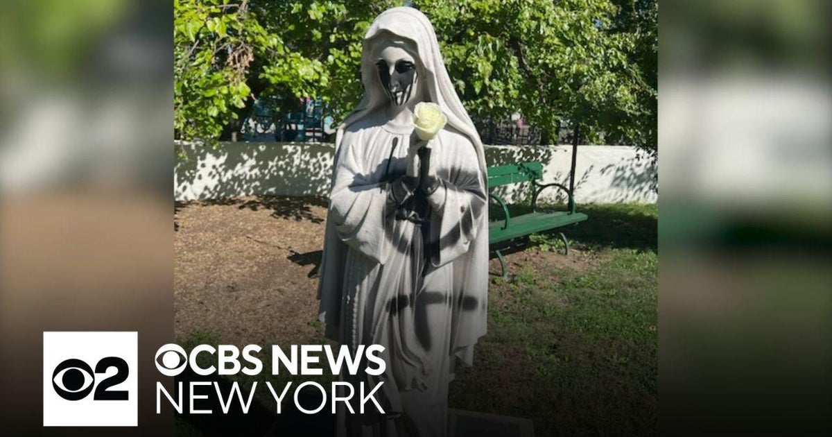 Fence, statue defaced at Washington Heights church - CBS New York