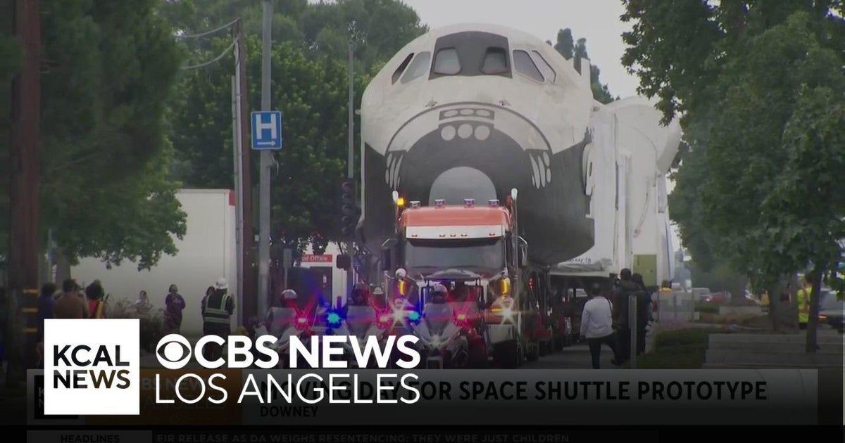 The mock space shuttle Inspiration moves through Downey street ahead of ...