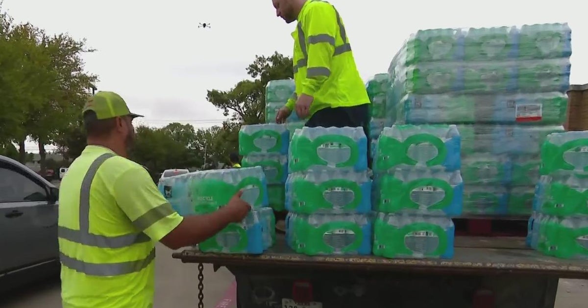 Richardson continues handing out cases of water to those impacted by ...
