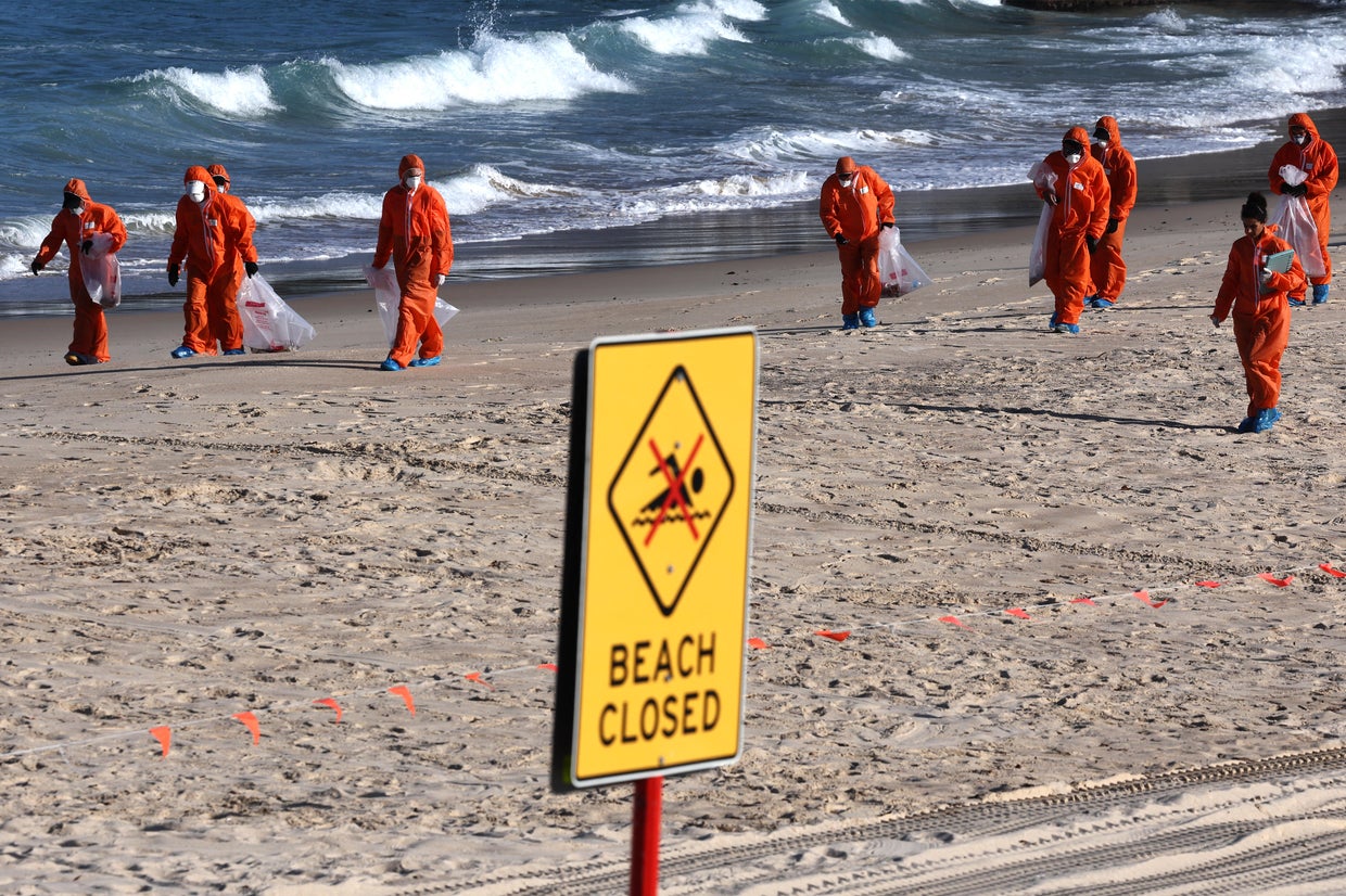 Origin of black balls on Australian beaches still a mystery, but ...