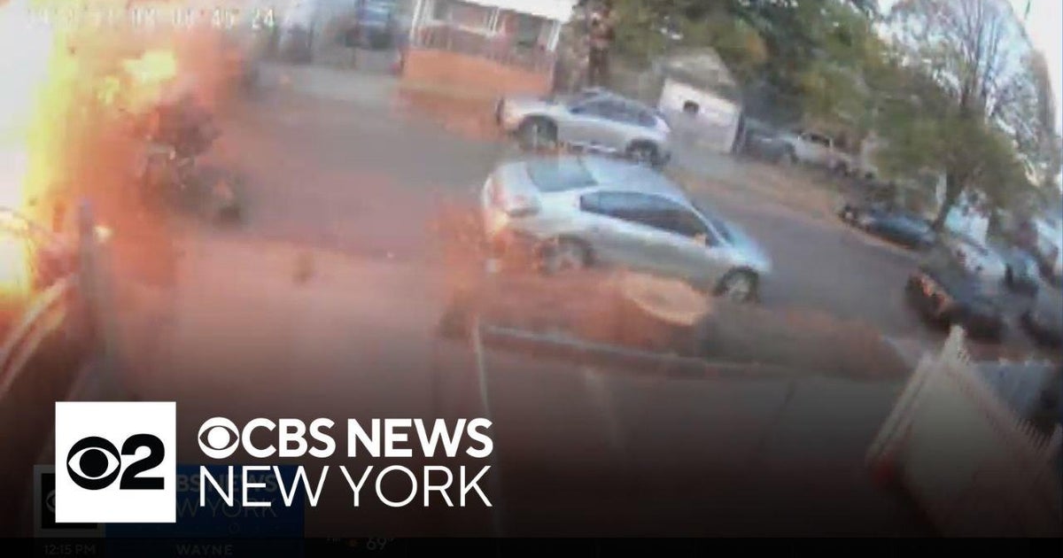 Surveillance video shows car explode on NYC street - CBS New York