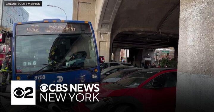 MTA bus crashes onto a sidewalk in Queens, injuring at least two ...