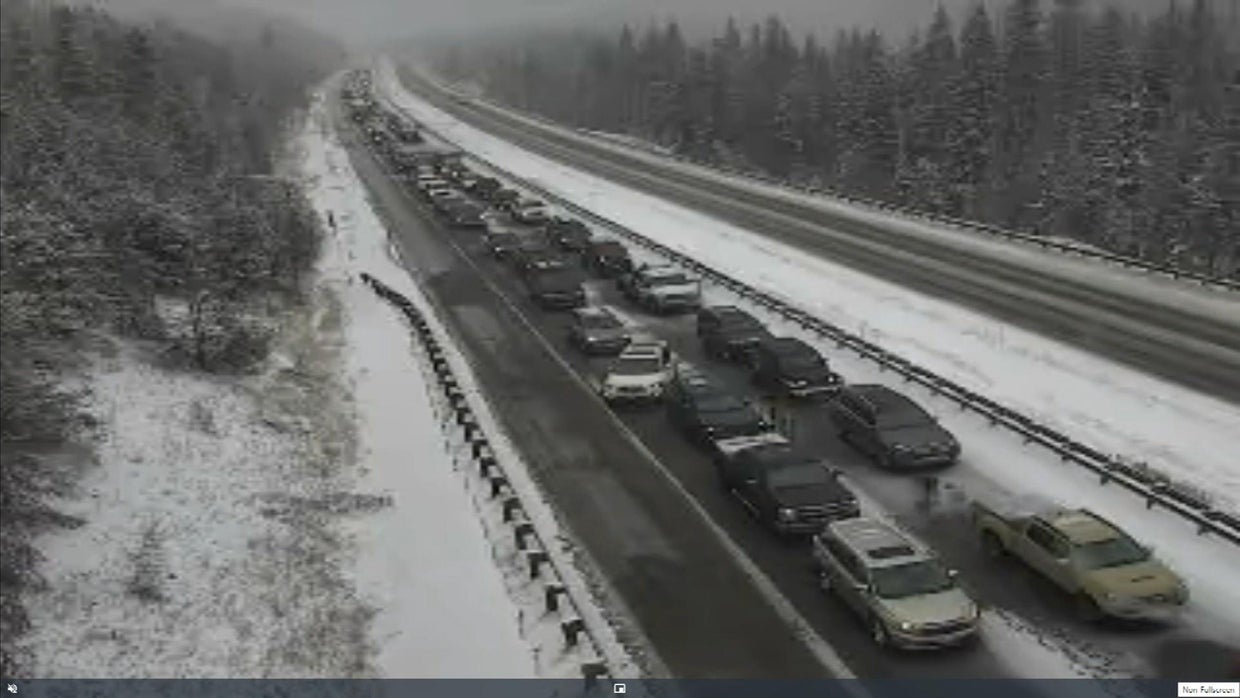 Watch I-70 driver get out of car and shovel snow in middle of clogged ...