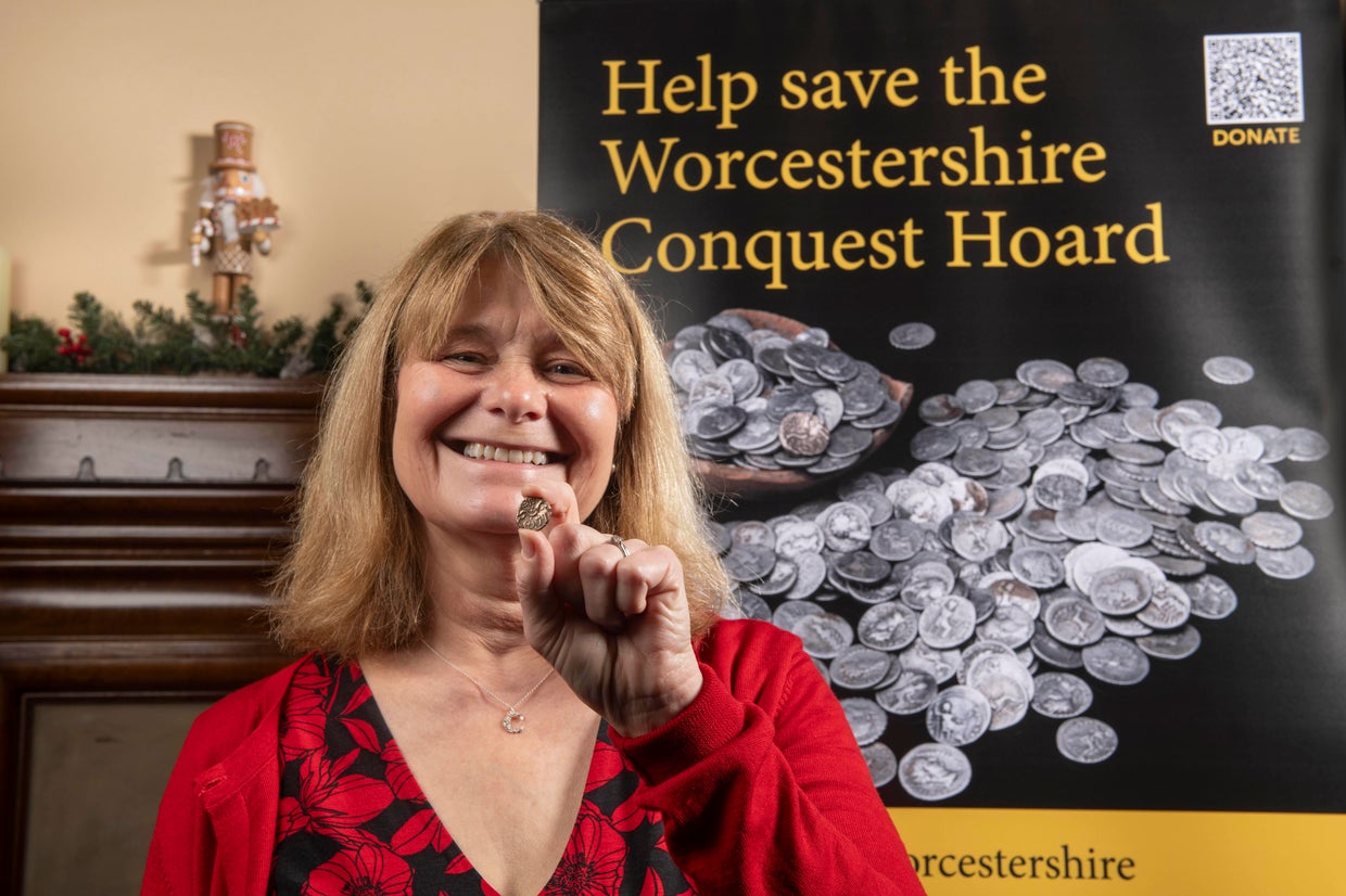 Treasure trove of Roman coins found during construction in U.K. - CBS News
