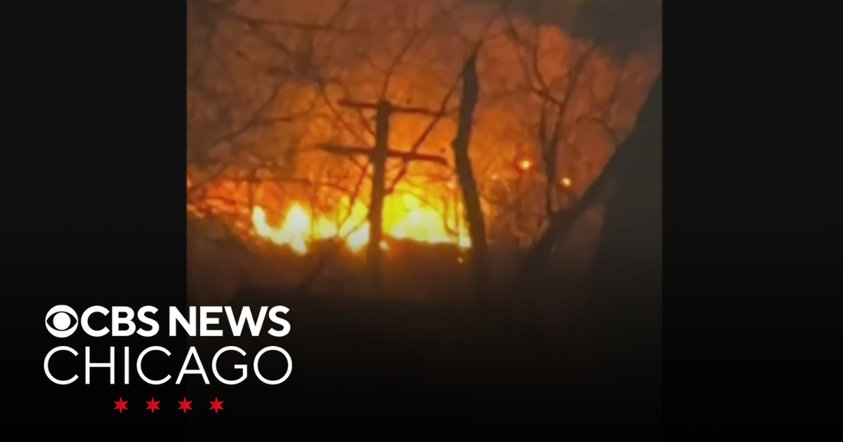 Fire devours homeless encampment in Elgin, Illinois - CBS Chicago