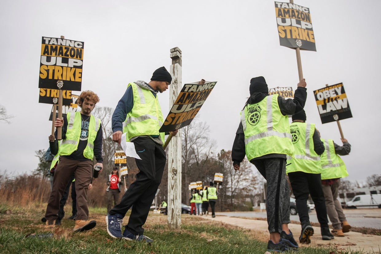 Amazon workers, led by Teamsters, launch strikes today in multiple cities - CBS News