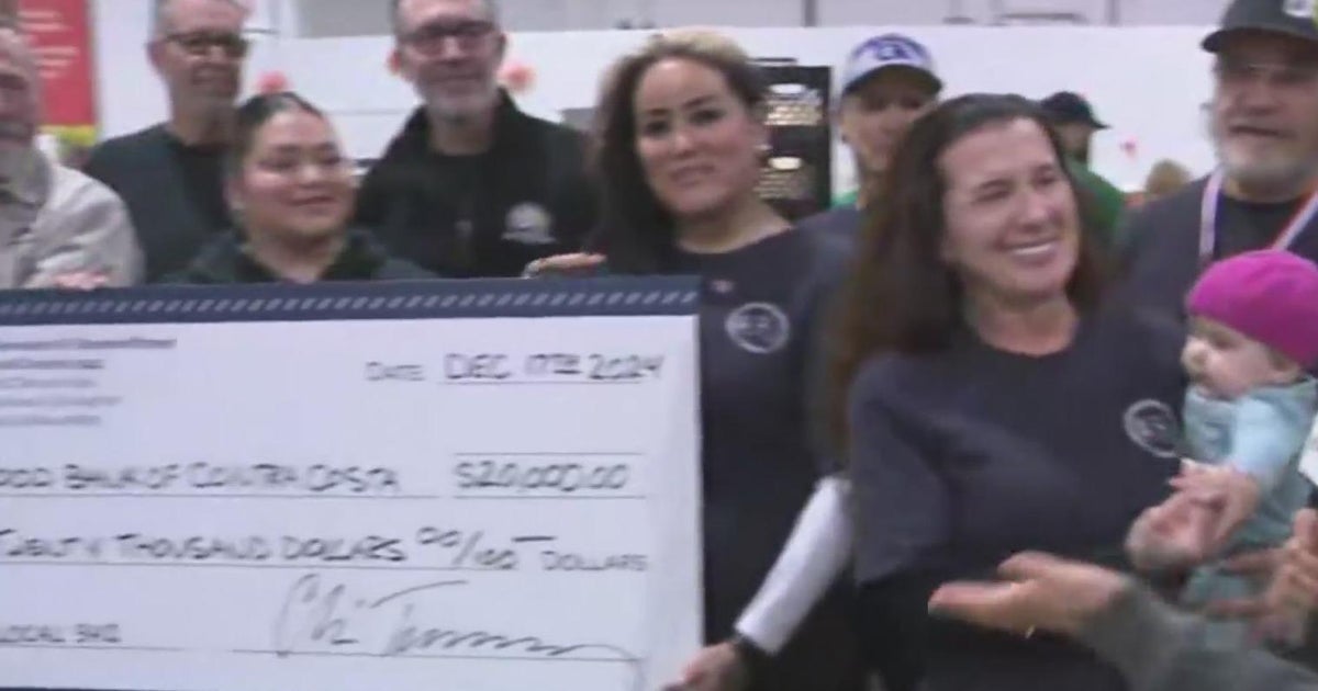 Plumbers and Steamfitters Local 342 donates $20,000 to food bank - CBS ...