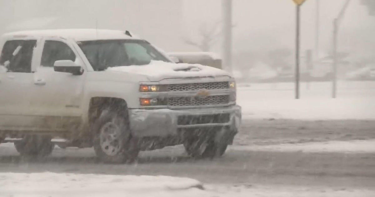 Winter storm brings heavy snow, freezing rain to southern U.S. - CBS News