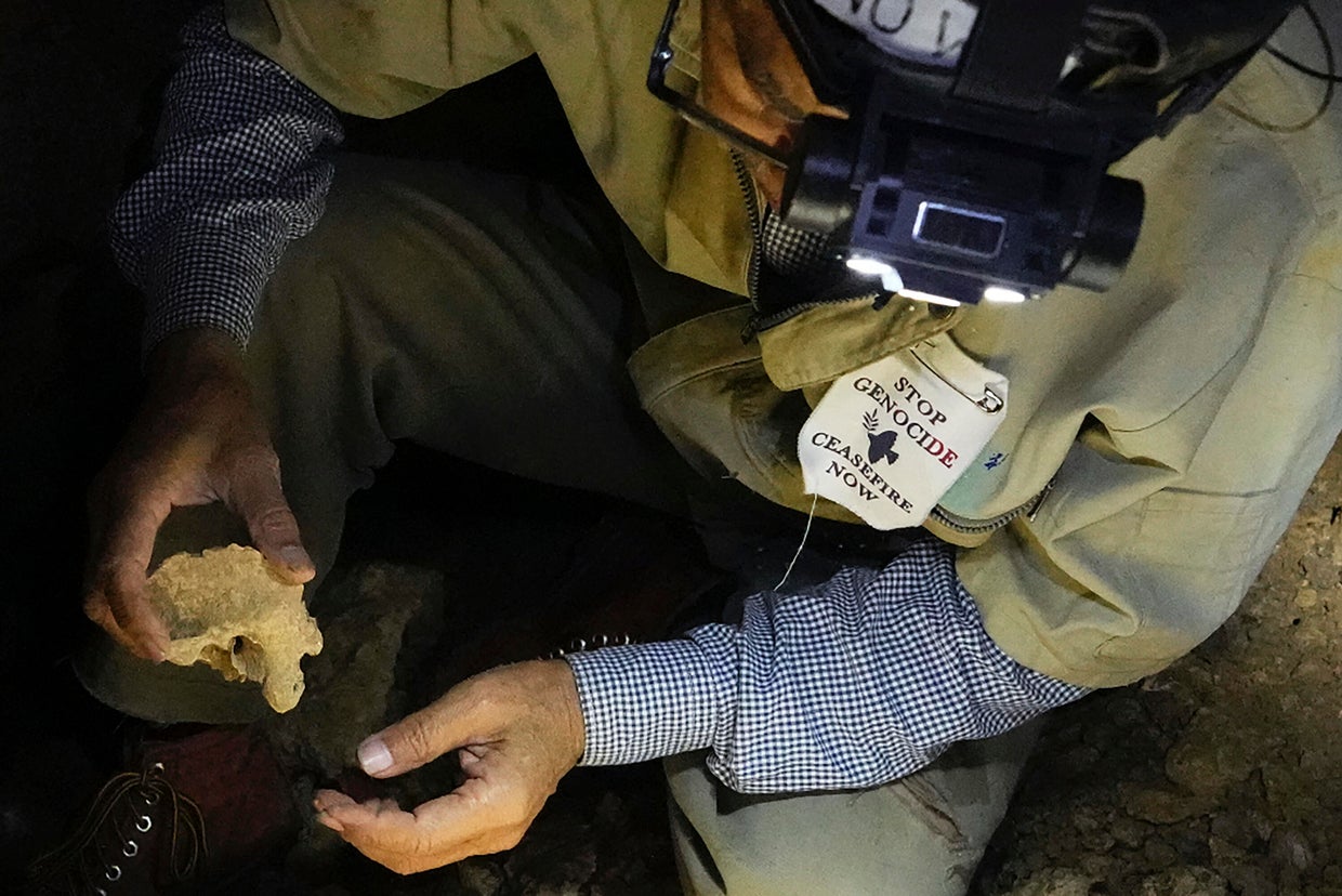Volunteer searching for WWII dead in Japanese caves unearths remains of ...