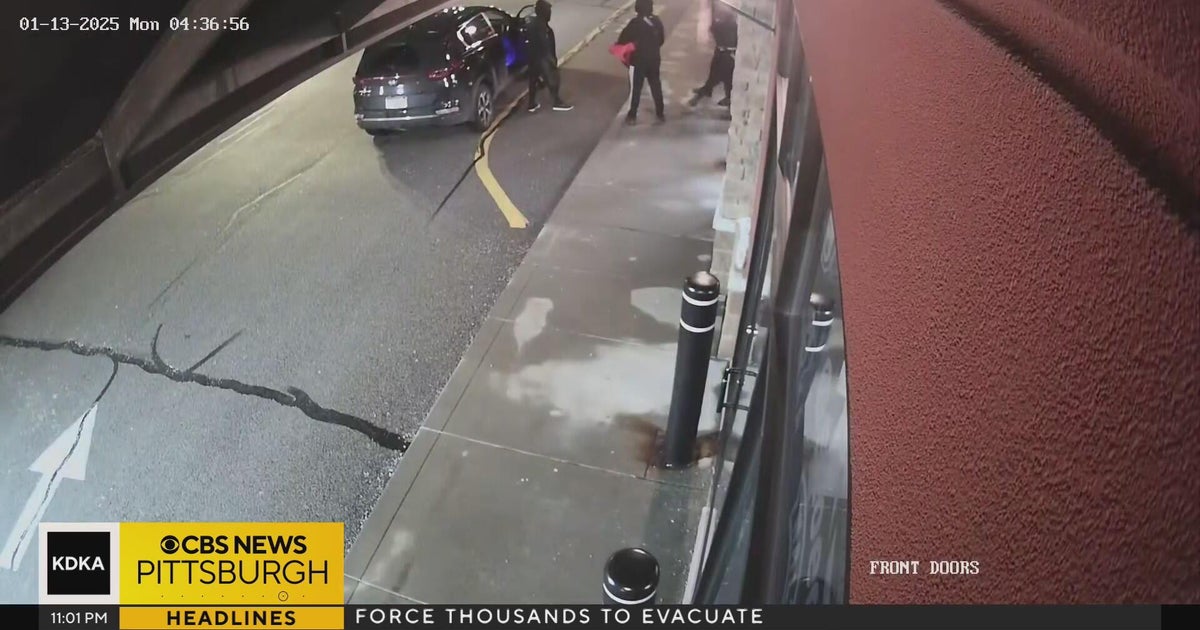 Security video shows suspects shooting their way into a gun store - CBS ...