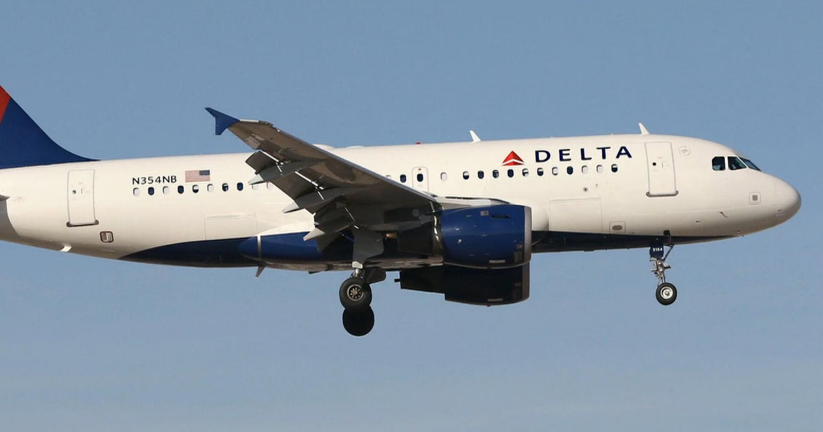 Delta plane, military jet have close call near Reagan National - CBS News