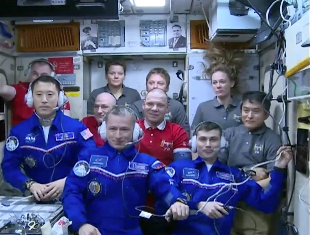 Rocket carrying NASA astronaut Jonny Kim, 2 Russian cosmonauts docks with space station - CBS News