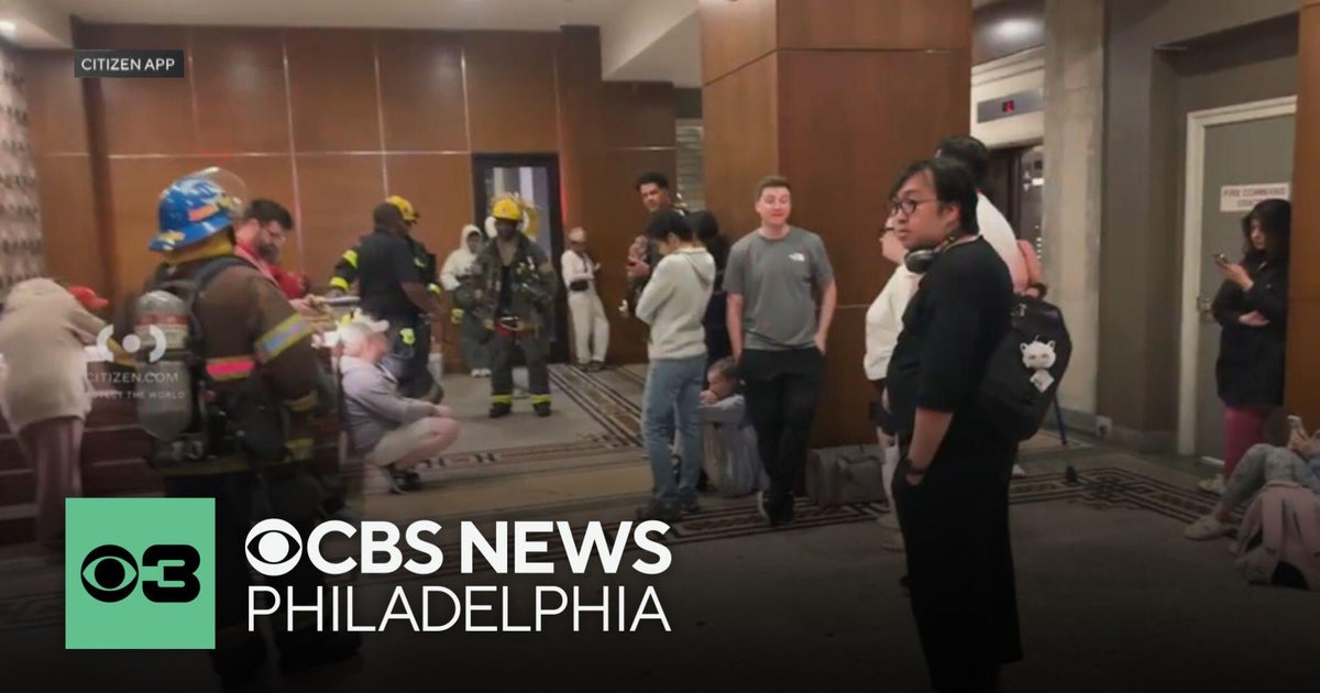 Residents evacuate after fire at high-rise building in Center City ...