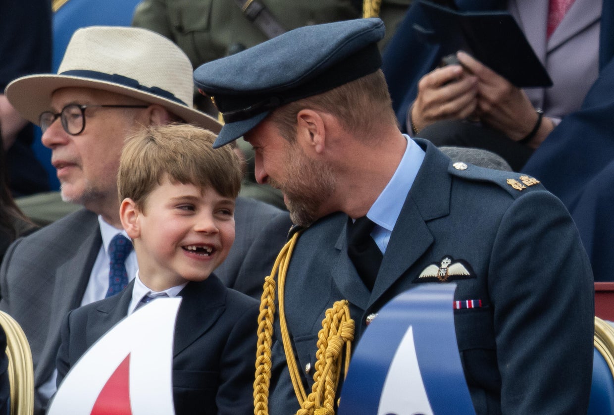 Pictures show royal family watching military procession, flypast to ...