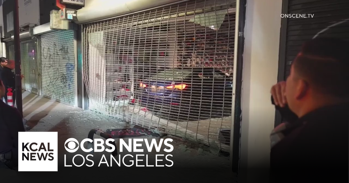 Burglars ditch car after smashing through Fairfax storefront - CBS Los ...