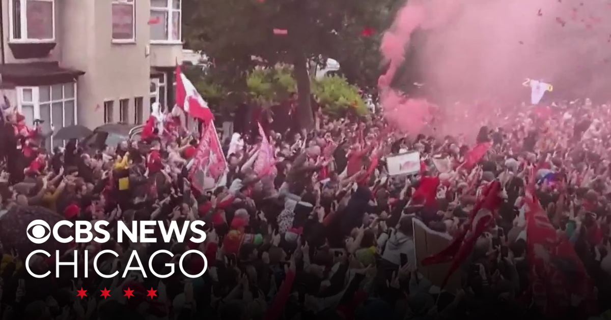 Man arrested after ramming car into fans at Liverpool parade ...