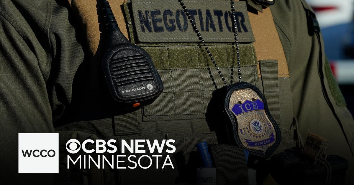 Why were federal agents wearing masks during Minneapolis raid? - CBS ...
