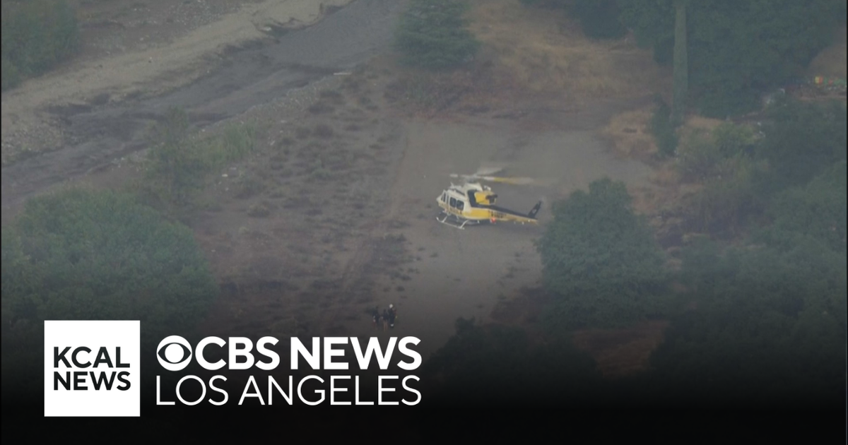LA County firefighters rescue stranded hikers during flash flood - CBS ...