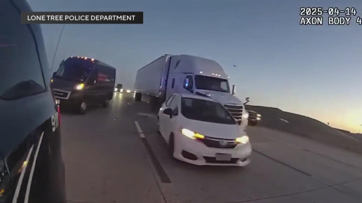Colorado police officer's body camera shows close call on I-25 - CBS ...