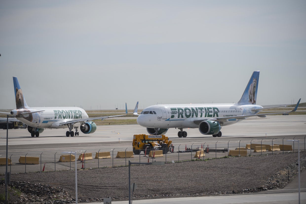 Frontier Airlines plane at Denver International Airport evacuated ...