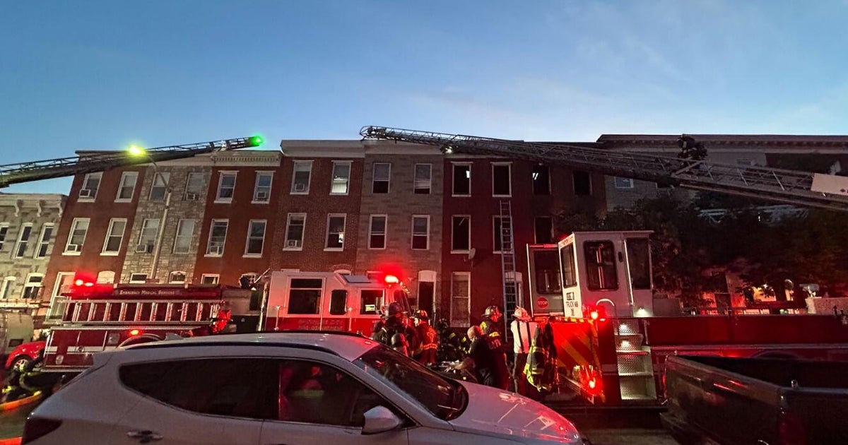 Firefighters battle two-alarm building fire in downtown Baltimore - CBS ...