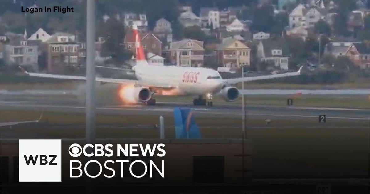 Video shows flames shoot out of airplane engine on Logan Airport runway ...