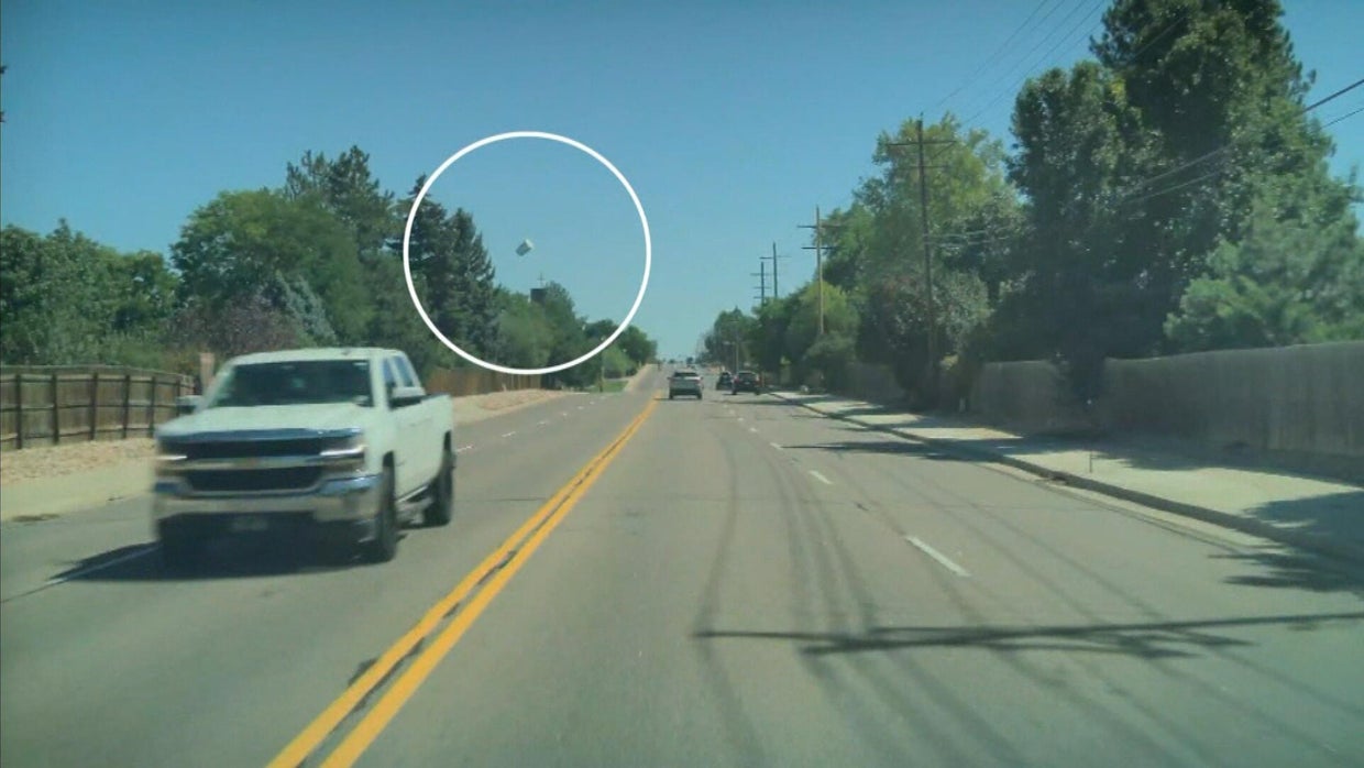 Video shows pickup truck passenger in Colorado throwing object at ...