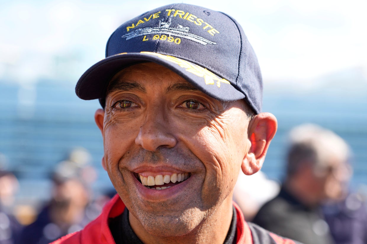 Man in a Ferrari on an aircraft carrier attempts to set record for ...