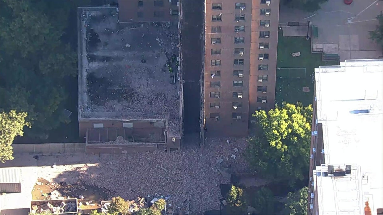 Bronx high-rise partially collapses after boiler room explosion. Video ...