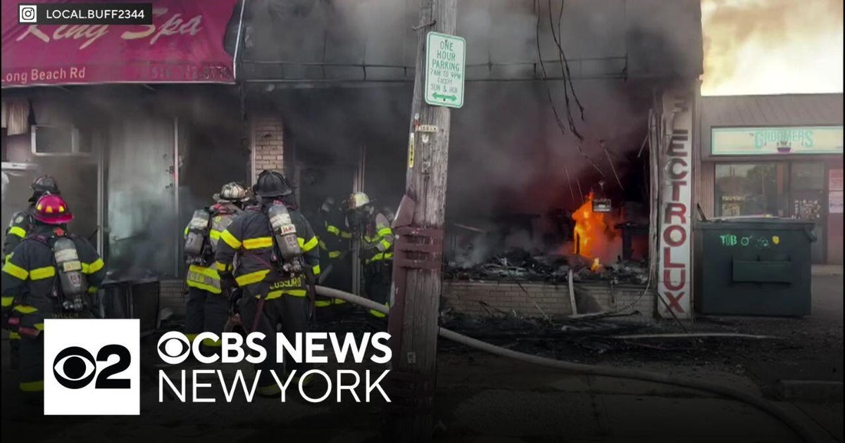 Crews battle fire at vacuum store in Oceanside, Long Island - CBS New York
