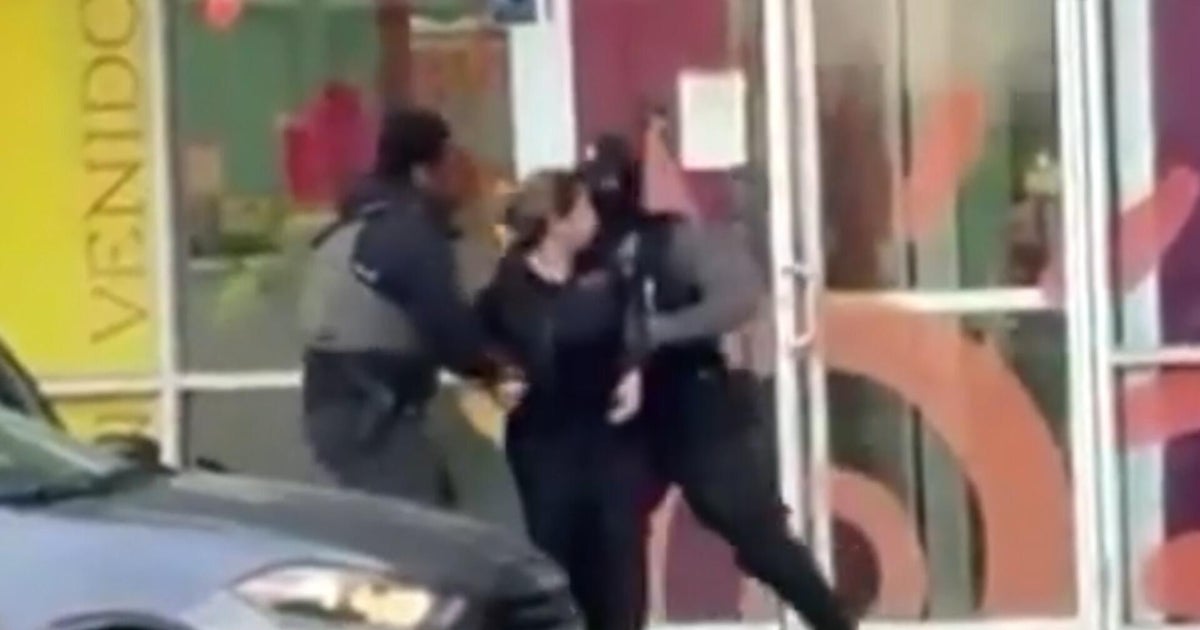 Watch: ICE arrests woman at daycare facility in Chicago - CBS News