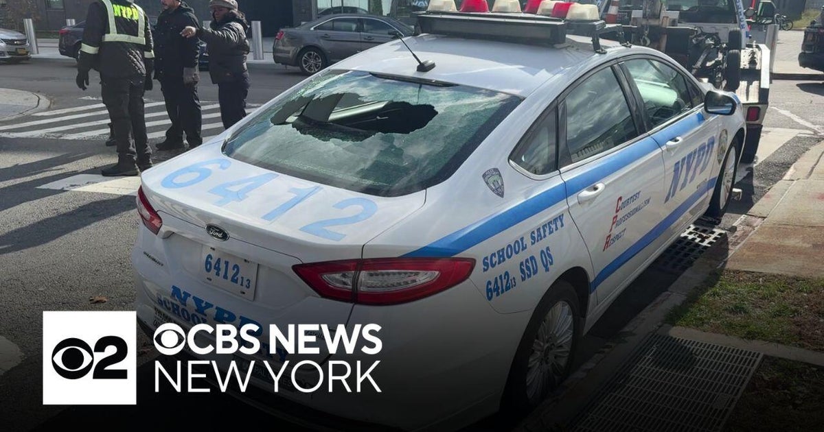 11 NYPD vehicles damaged outside precinct in Queens - CBS New York
