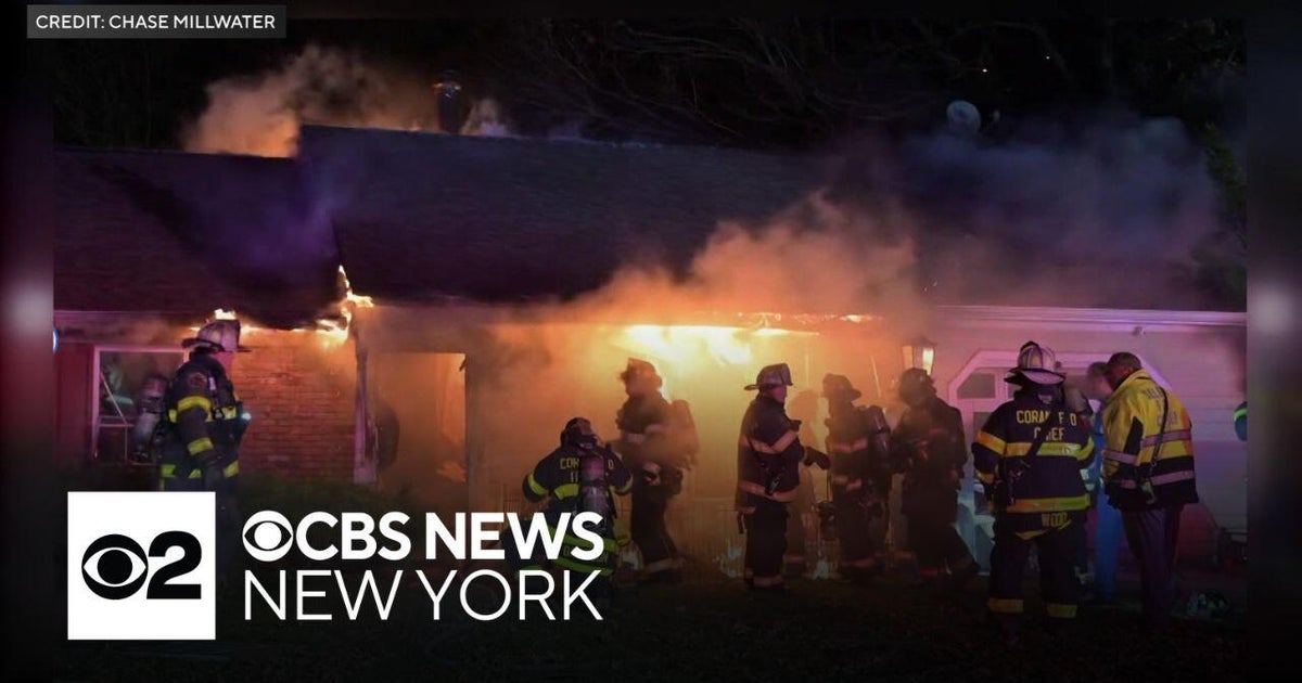 Neighbor charged with arson in Coram house fire - CBS New York